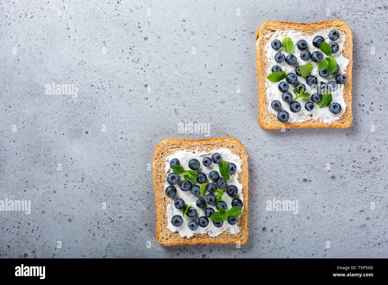 Delicious open sandwich with chocolate and banana Stock Photo - Alamy
