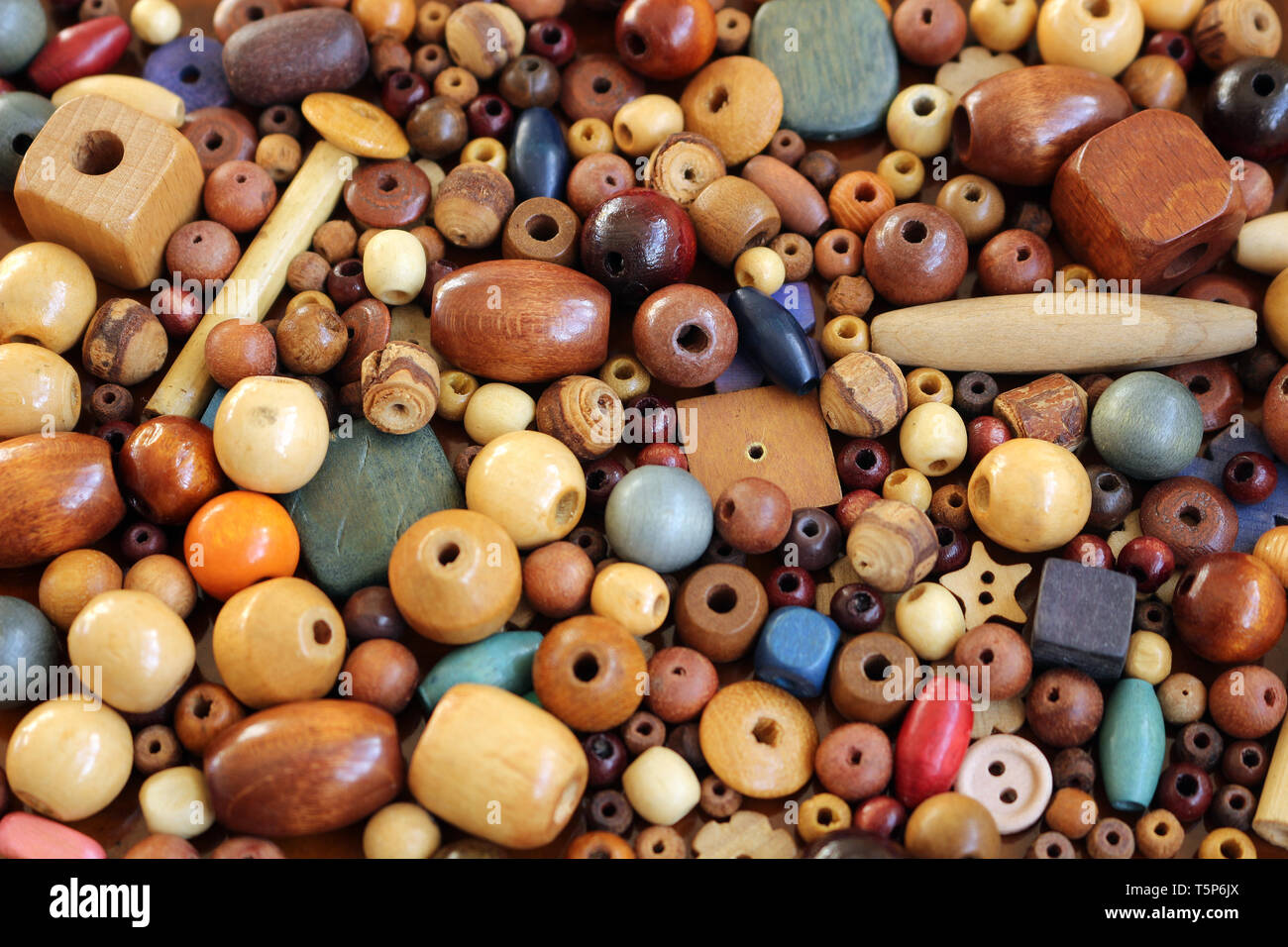 A pile of different wooden beads for making jewellery items Stock Photo ...