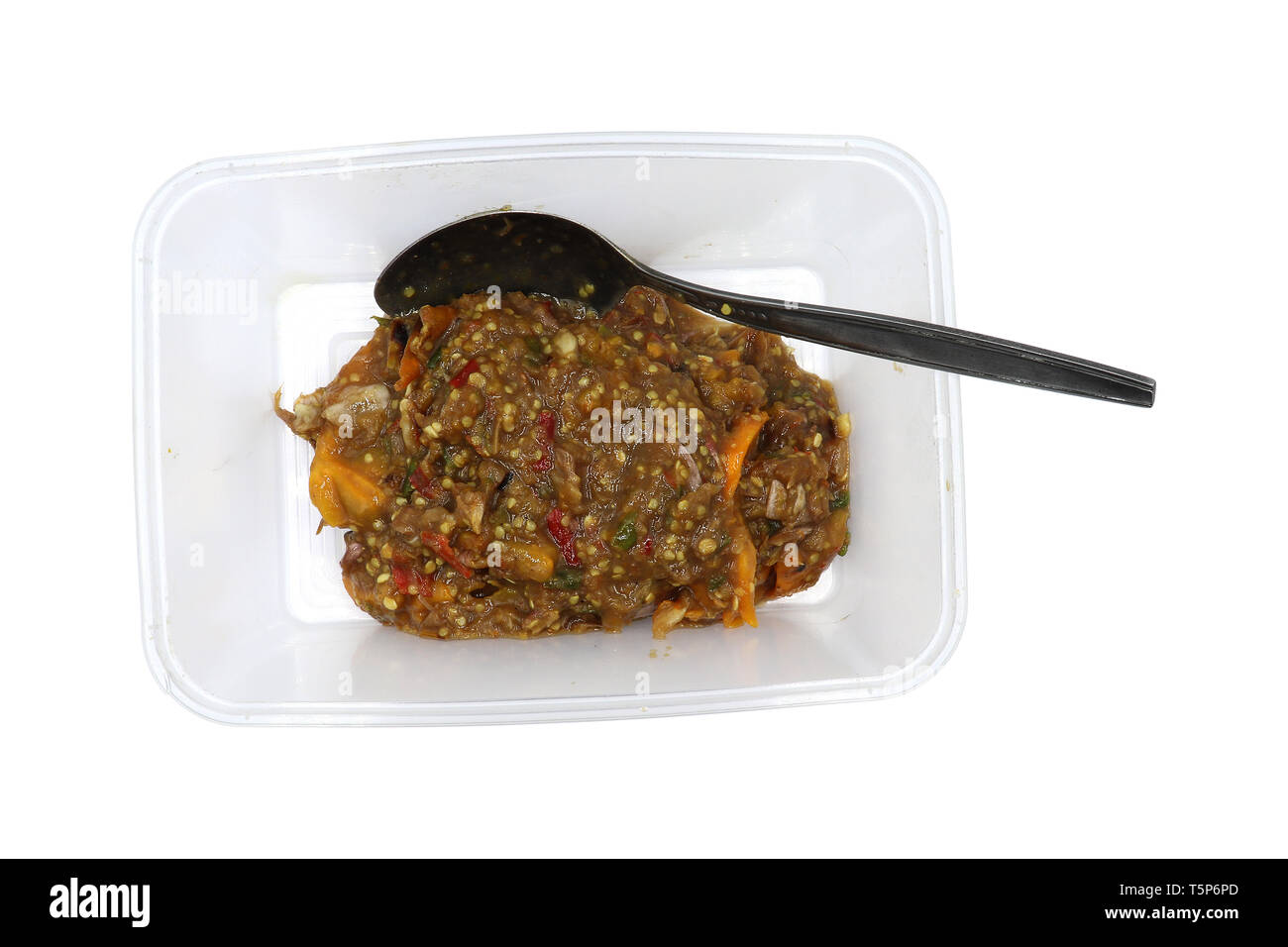 Fermented fish spicy dip in Tupperware isolated on white background ...