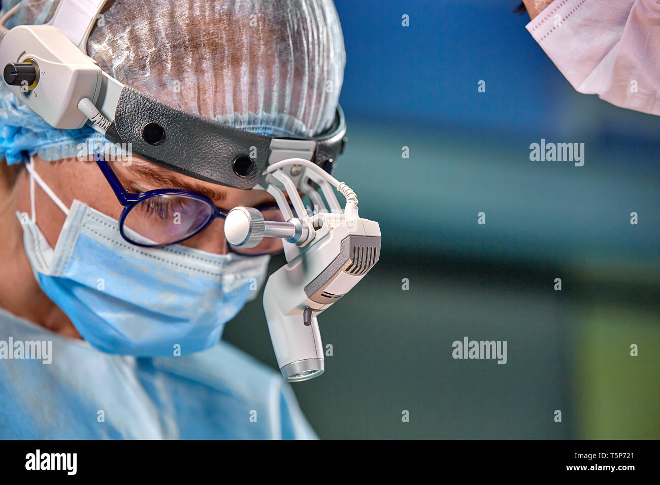Surgical headlight hi-res stock photography and images - Alamy