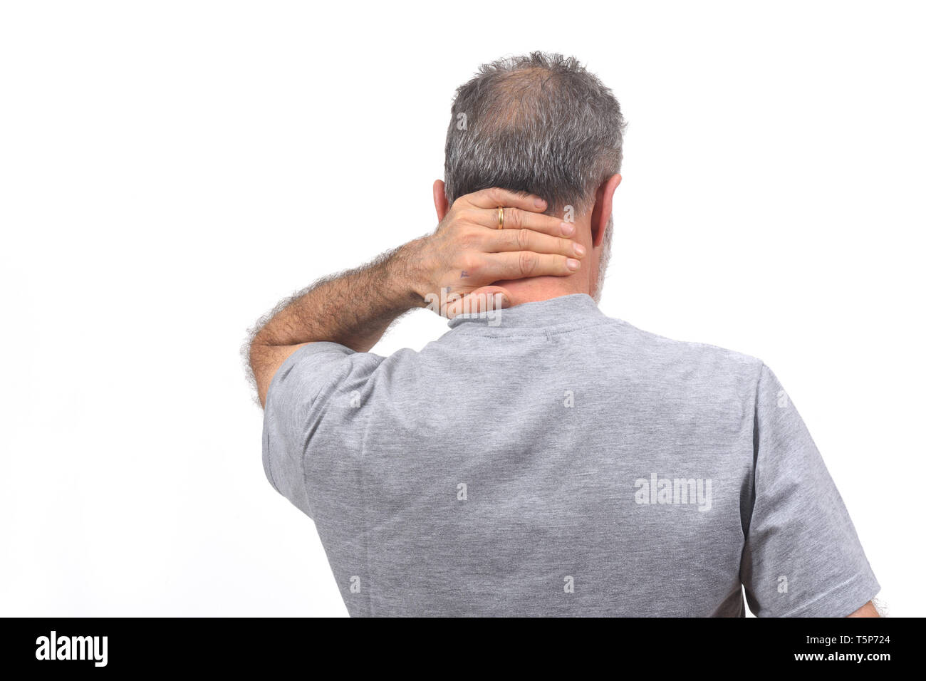 man with pain on nape on white background Stock Photo - Alamy