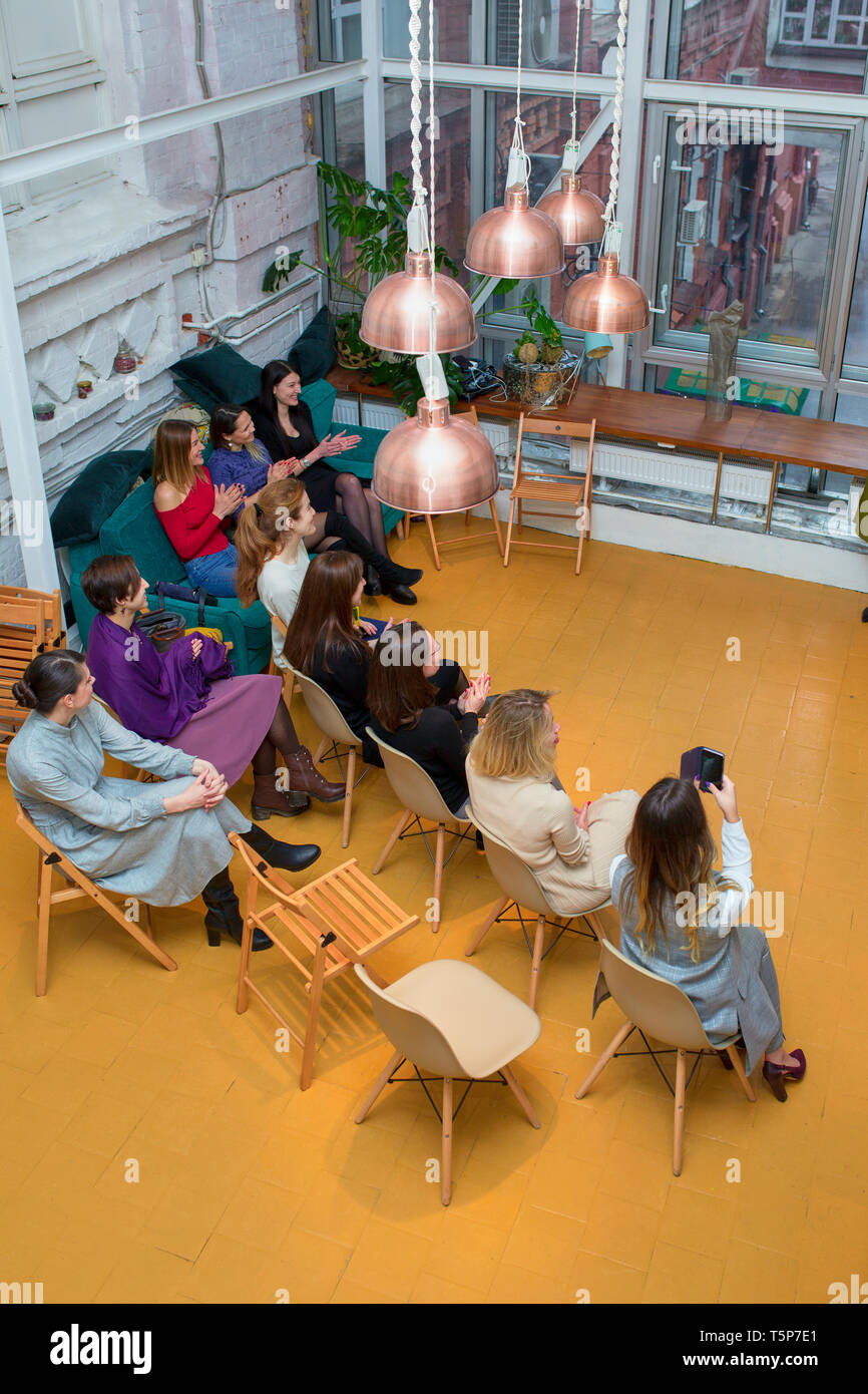 Abstract people lecture in seminar room, education or training concept ...