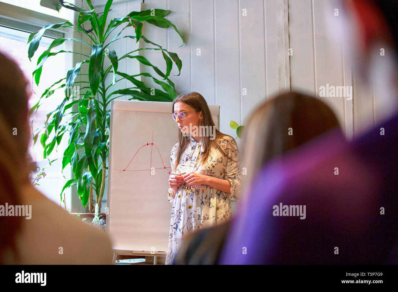 Abstract people lecture in seminar room, education or training concept ...