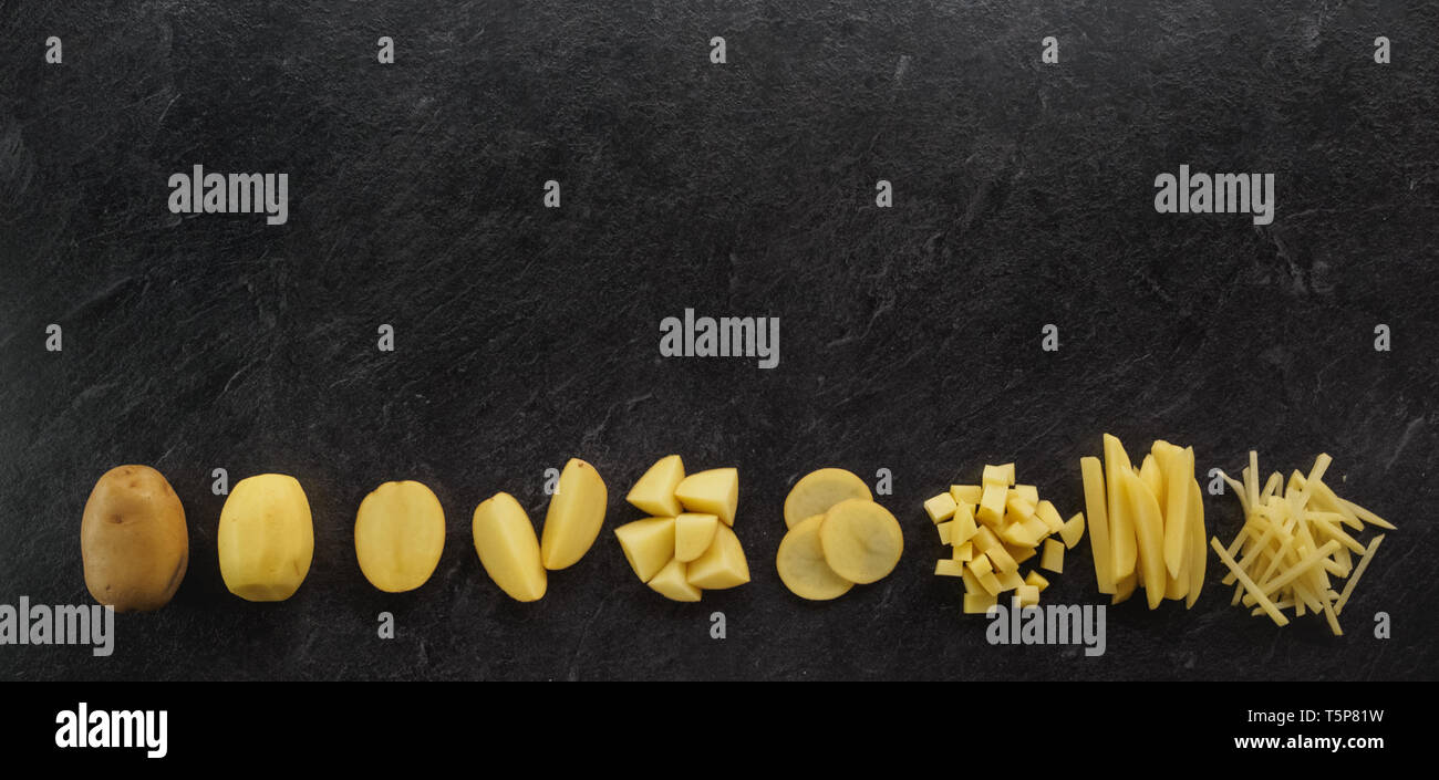 Different cuts of potatoes on a black textured background. Photo taken ...