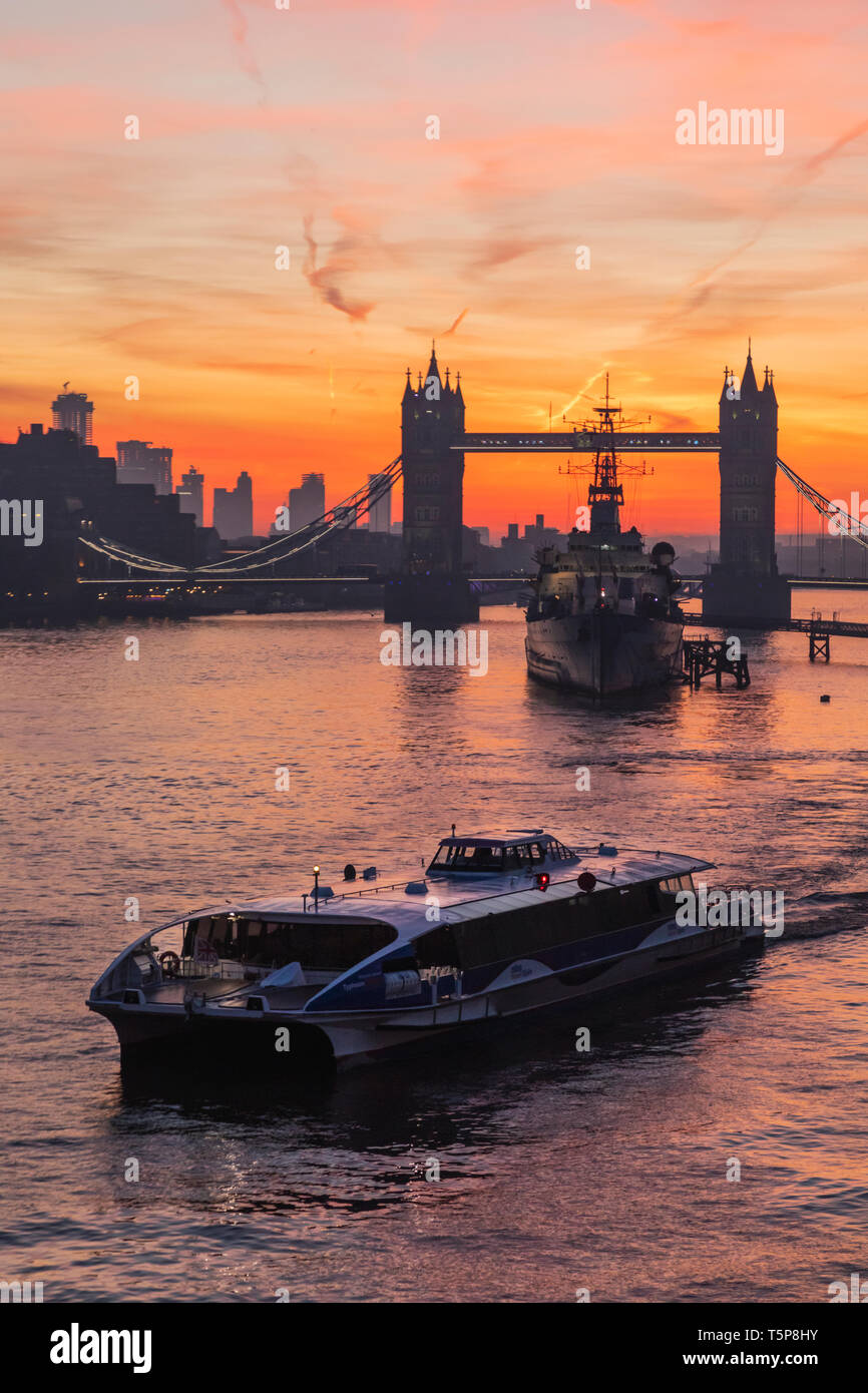 England, London, Tower Bridge at Dawn and Thames Clipper Stock Photo ...