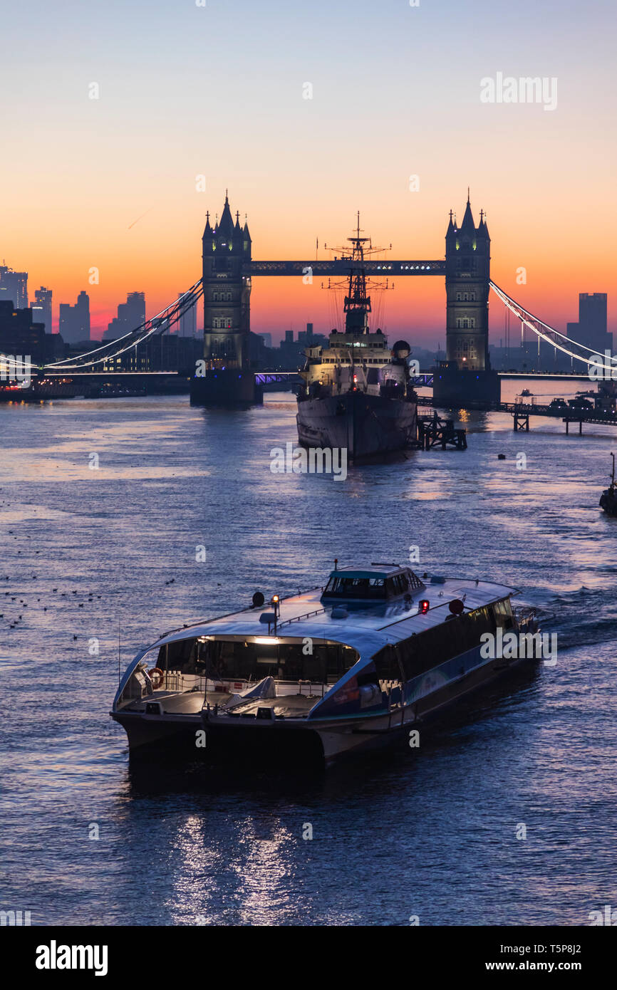 England, London, Tower Bridge at Dawn and Thames Clipper Stock Photo ...