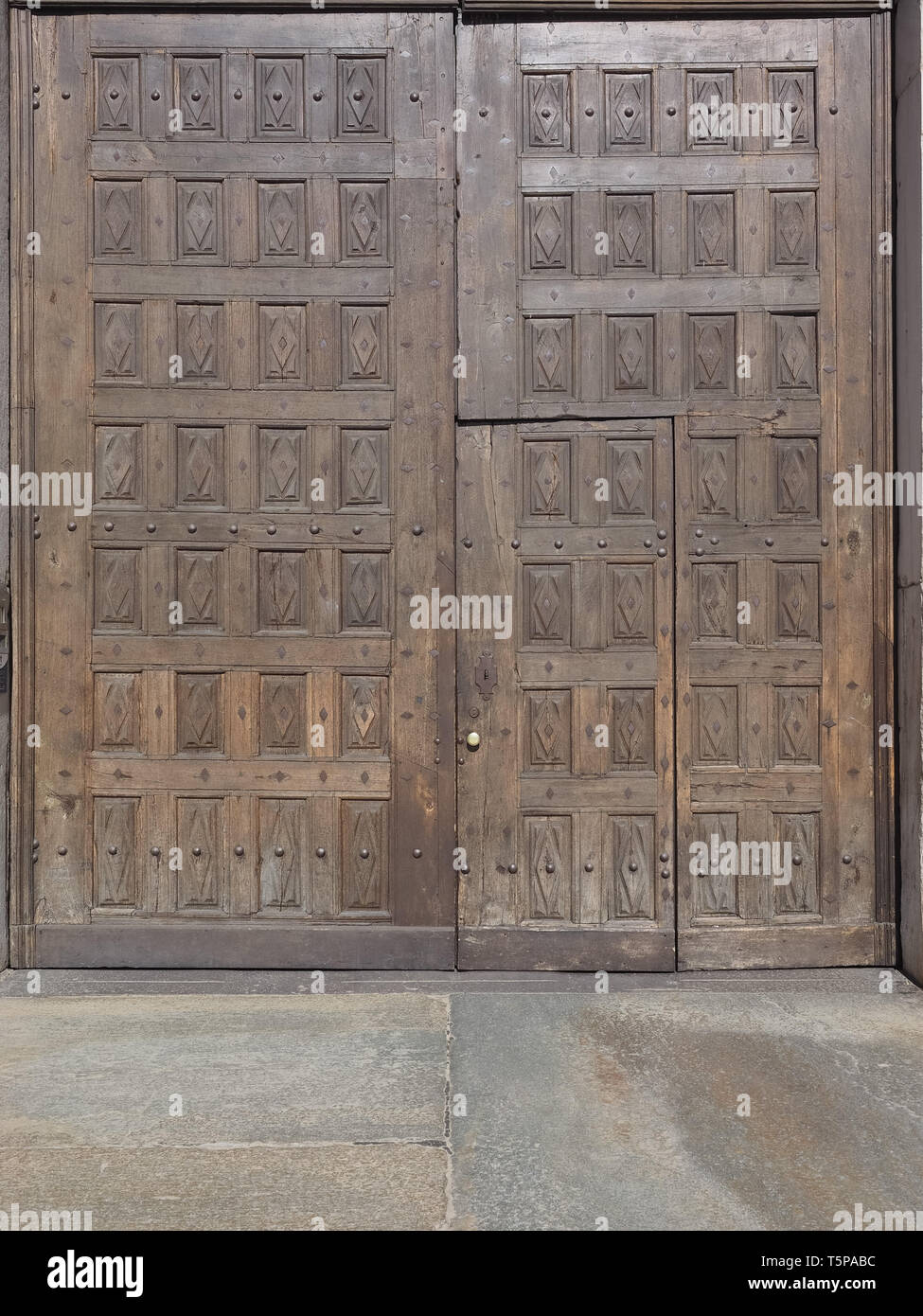 Ancient wooden entrance door at Palazzo Reale (meaning Royal Palace) in ...