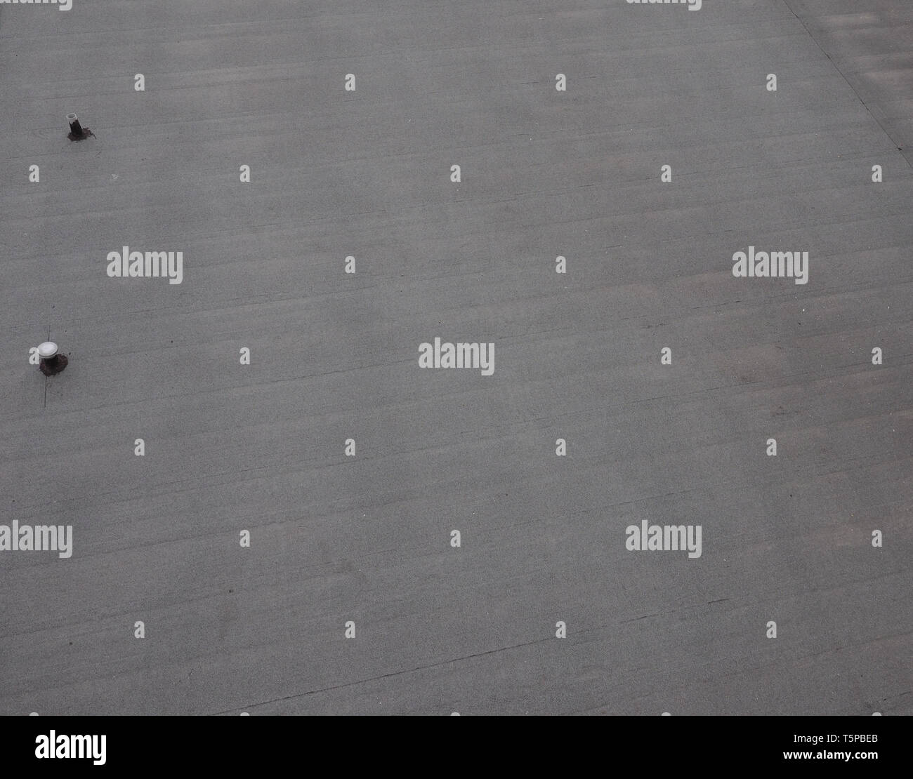 grey tarmac roof texture useful as a background Stock Photo - Alamy