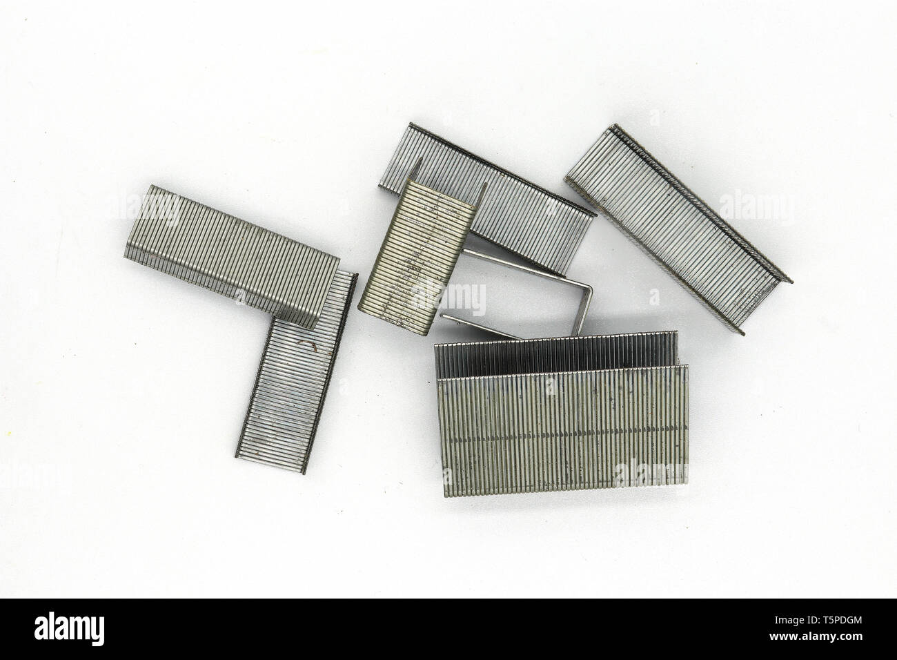 Metal staples for stapler isolated on white background Stock Photo - Alamy