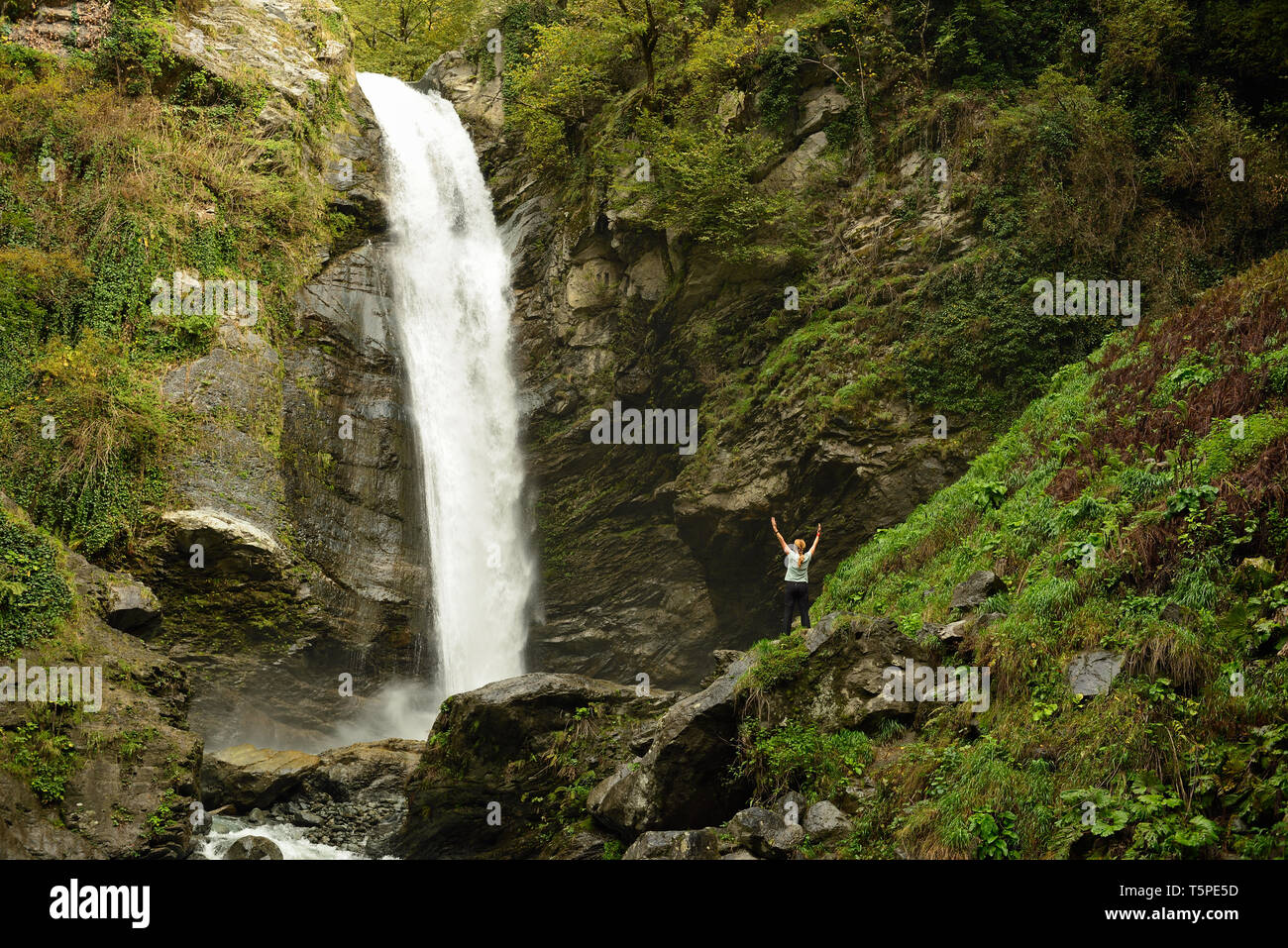 Tourist at Gurgeniani waterfall in Lagodekhi Nature Reserve in Georgia ...