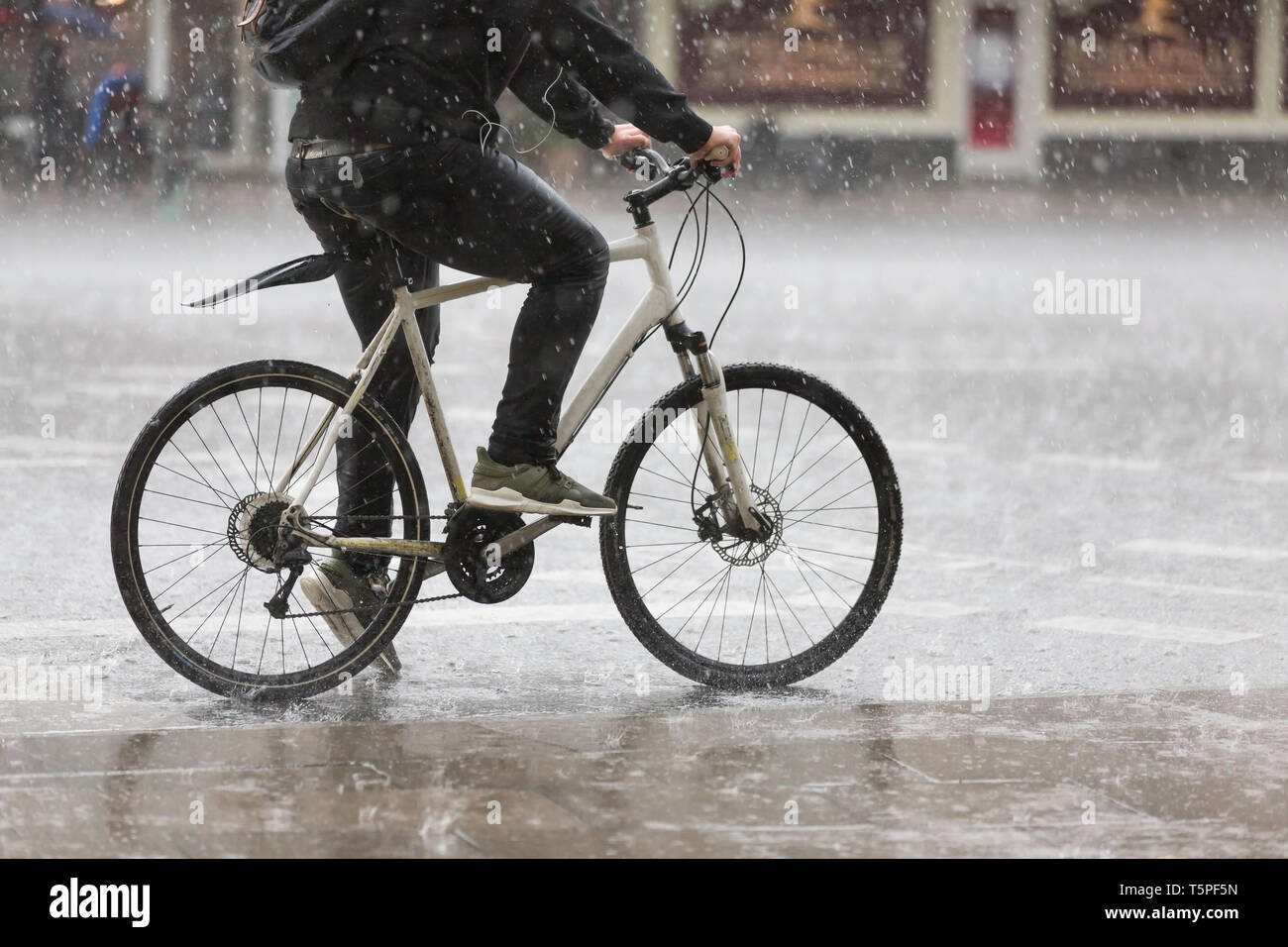 Black male riding bicycle hi-res stock photography and images - Alamy