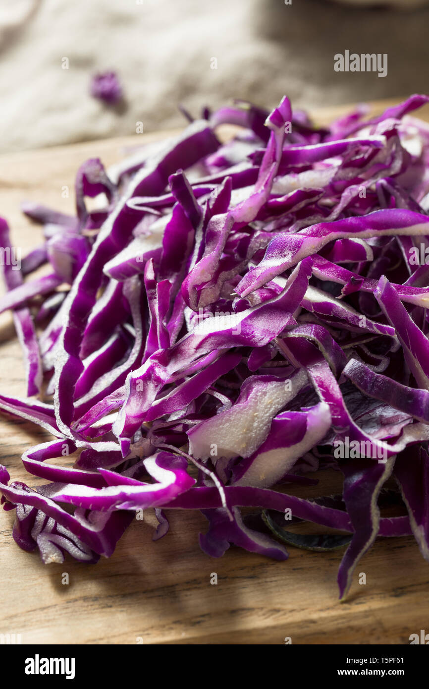 Raw Shredded Purple Cabbage on a Cutting Board Stock Photo - Alamy