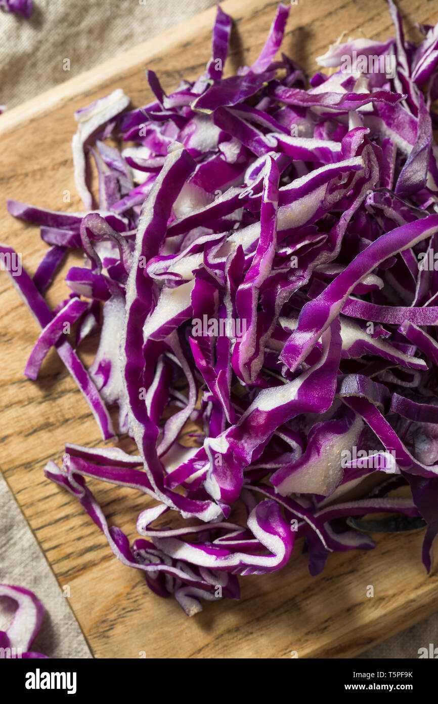 Raw Shredded Purple Cabbage on a Cutting Board Stock Photo - Alamy