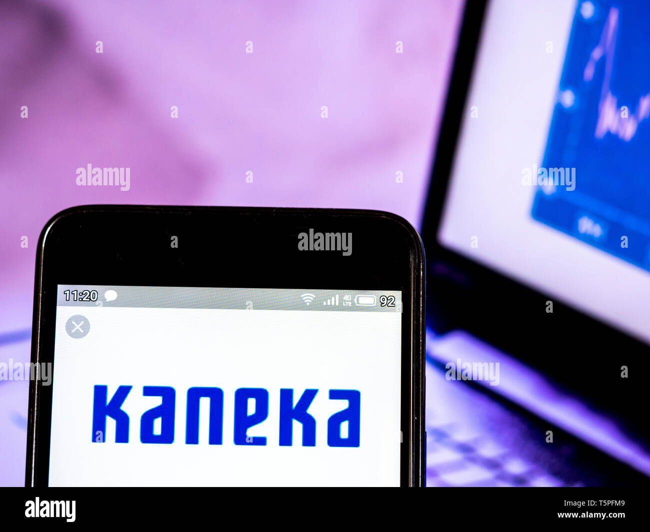 In this photo illustration a Kaneka Corporation logo seen displayed on ...
