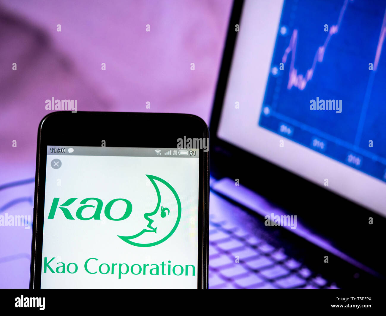 In this photo illustration a Kao Corporation logo seen displayed on a ...
