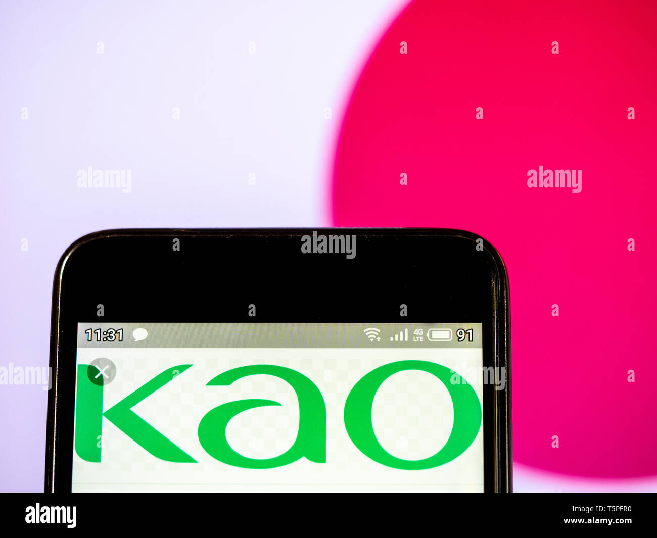 In this photo illustration a Kao Corporation logo seen displayed on a ...