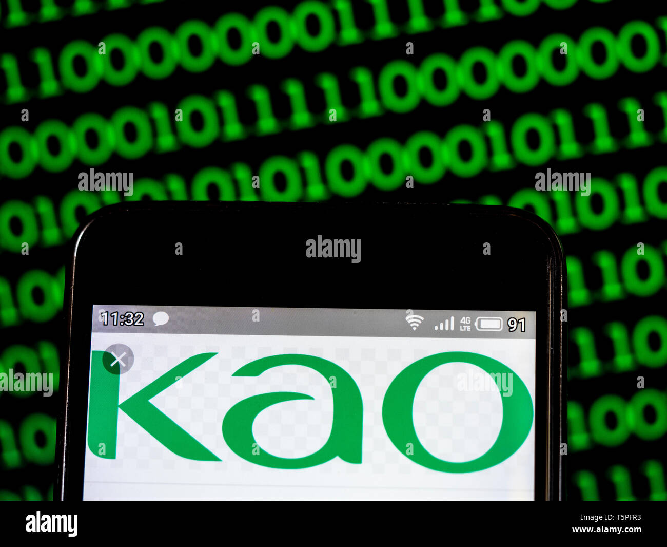 In this photo illustration a Kao Corporation logo seen displayed on a ...