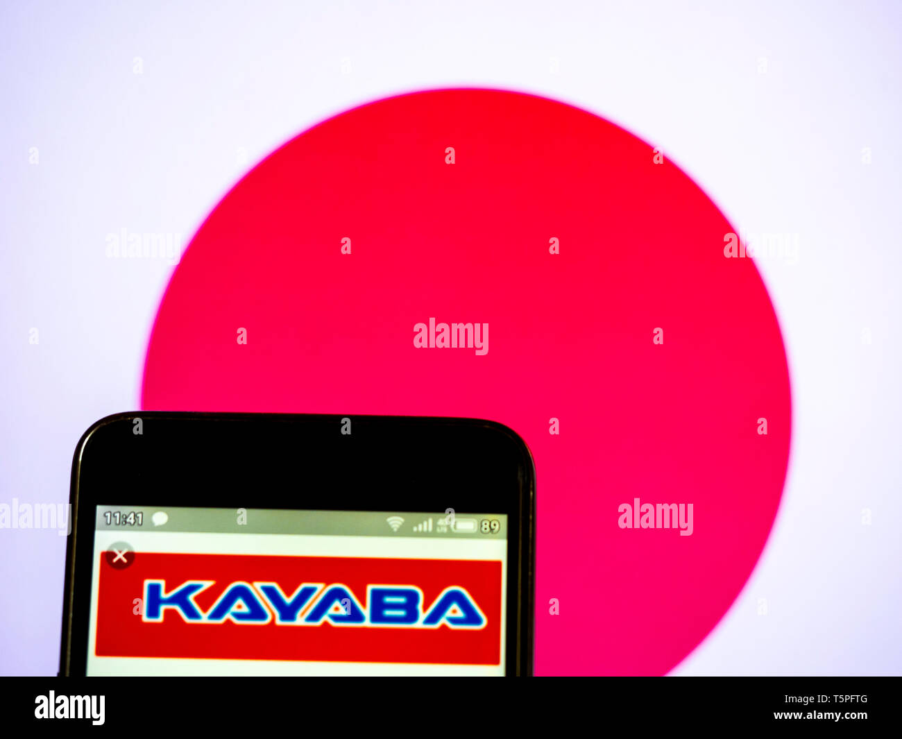 In this photo illustration a Kayaba Industry logo seen displayed on a ...