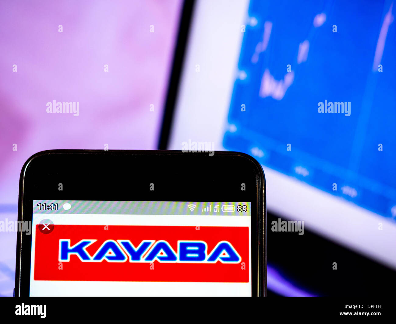 In this photo illustration a Kayaba Industry logo seen displayed on a ...
