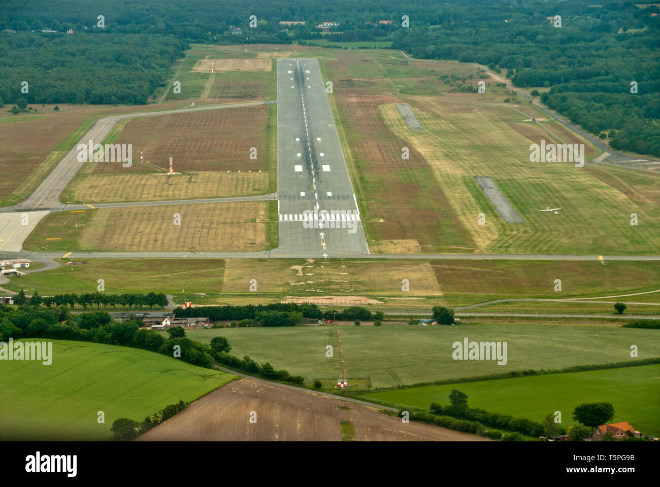 a view from the cockpit of a sports aircraft to the runway of an ...