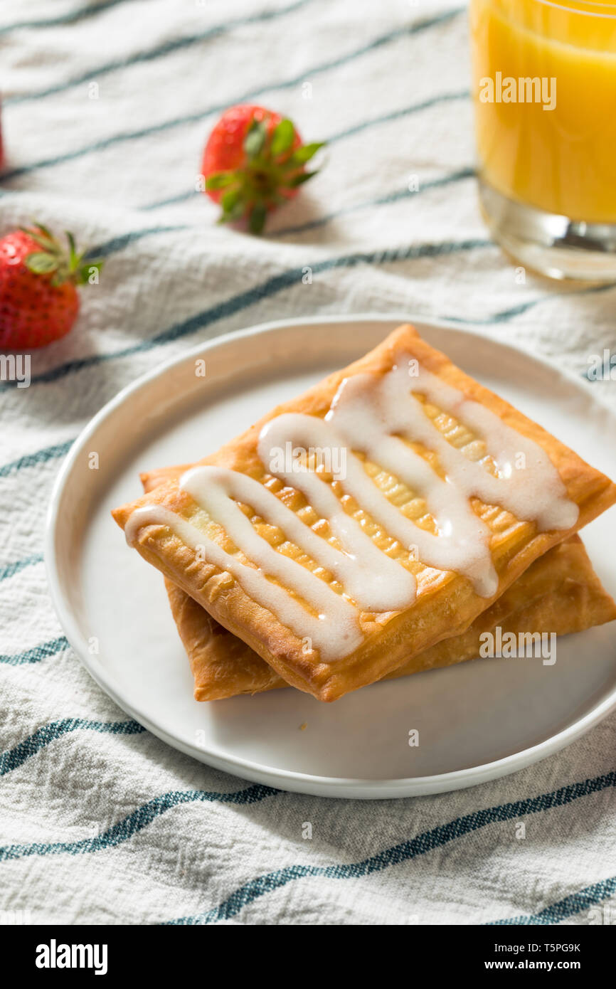 Sweet Breakfast Strawberry Toaster Pastry with Frosting Stock Photo - Alamy