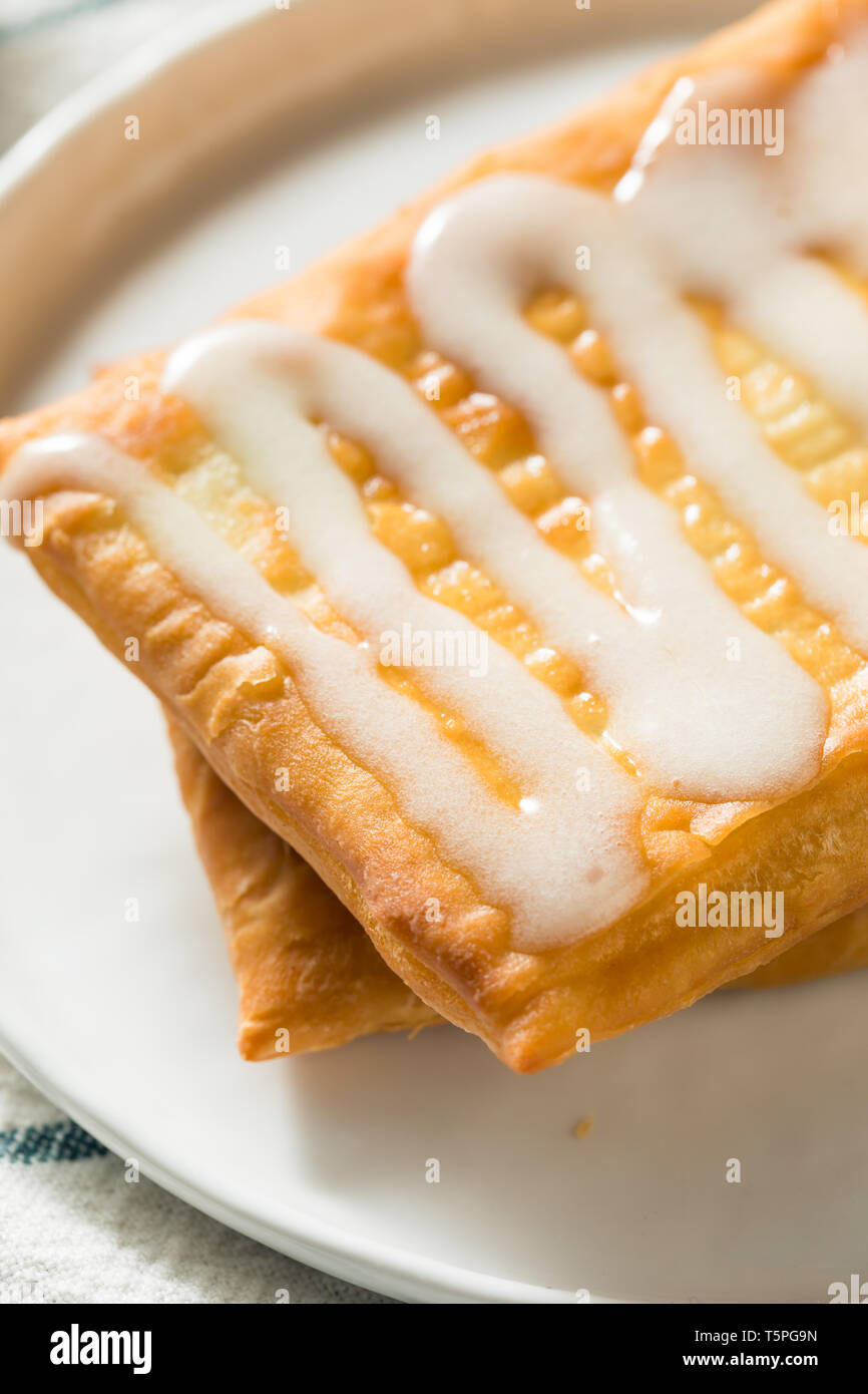 Sweet Breakfast Strawberry Toaster Pastry with Frosting Stock Photo - Alamy