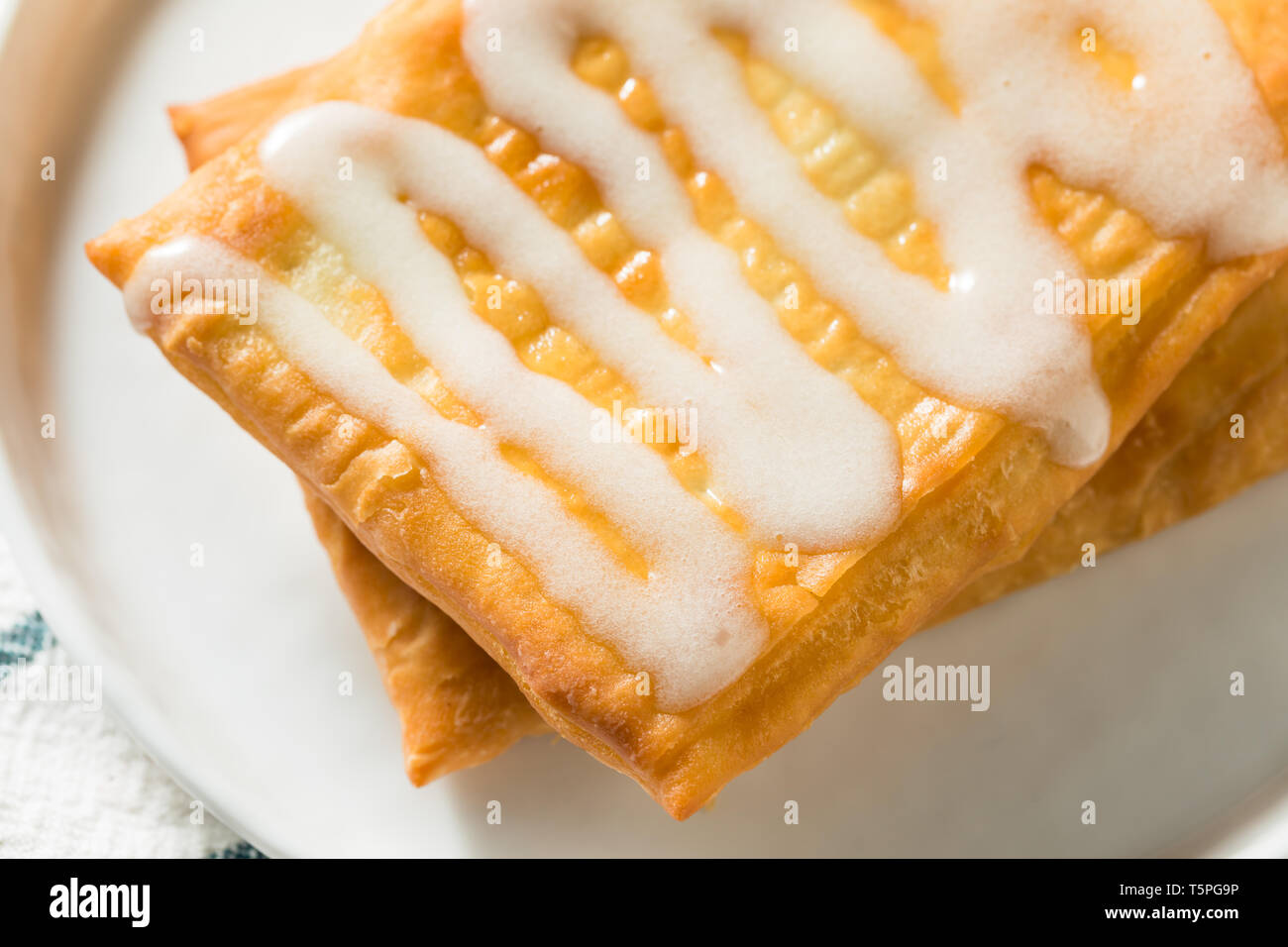 Sweet Breakfast Strawberry Toaster Pastry with Frosting Stock Photo - Alamy