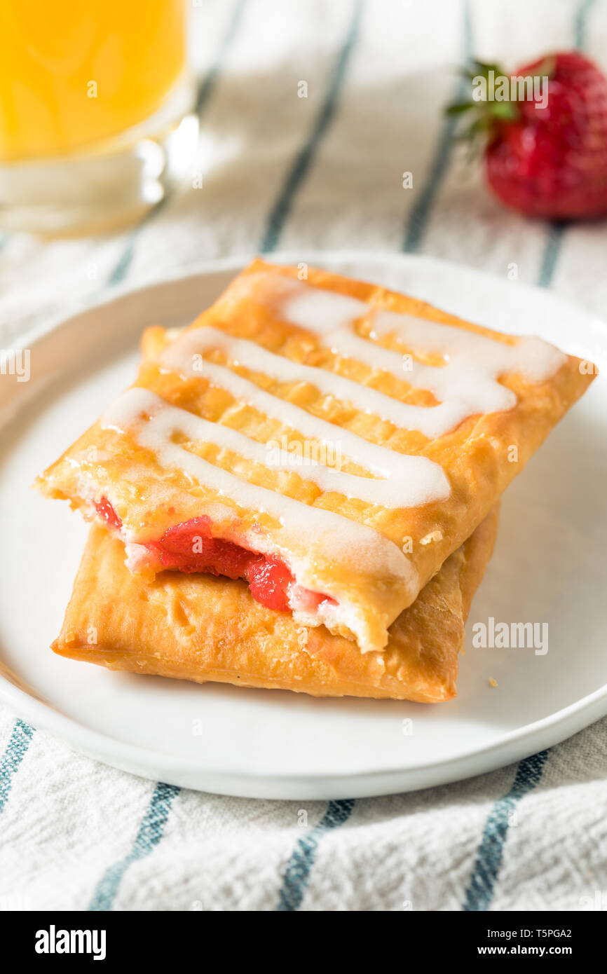 Sweet Breakfast Strawberry Toaster Pastry with Frosting Stock Photo - Alamy