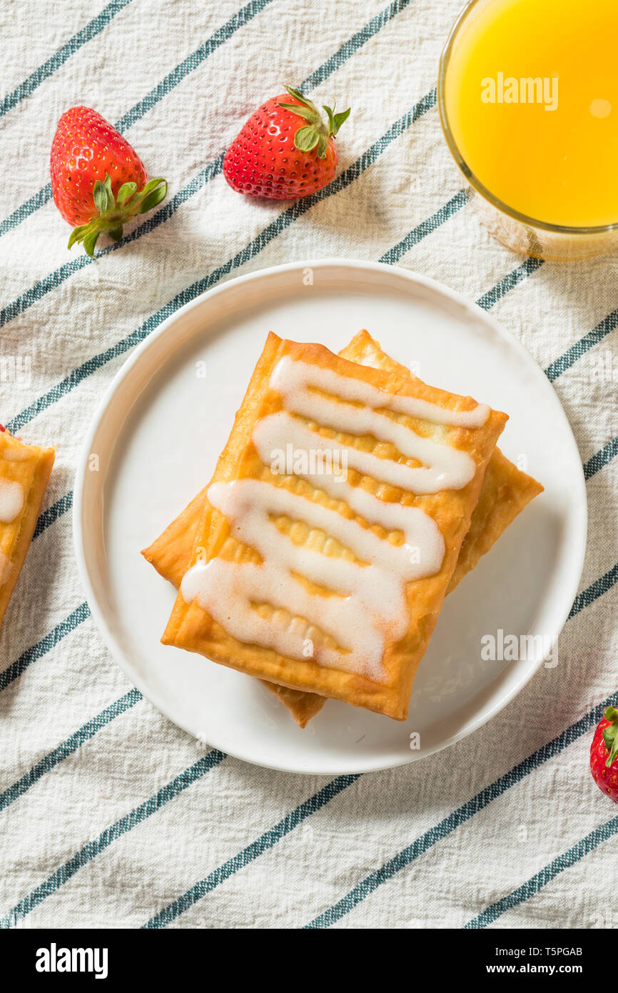 Sweet Breakfast Strawberry Toaster Pastry with Frosting Stock Photo - Alamy