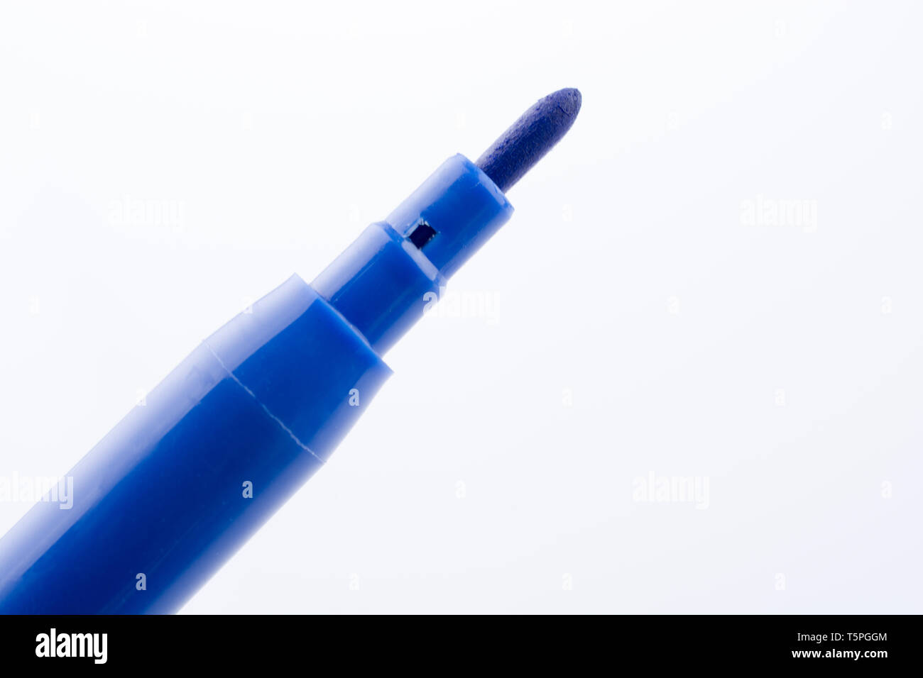 Felt-tip pen of blue color on a white background Stock Photo - Alamy