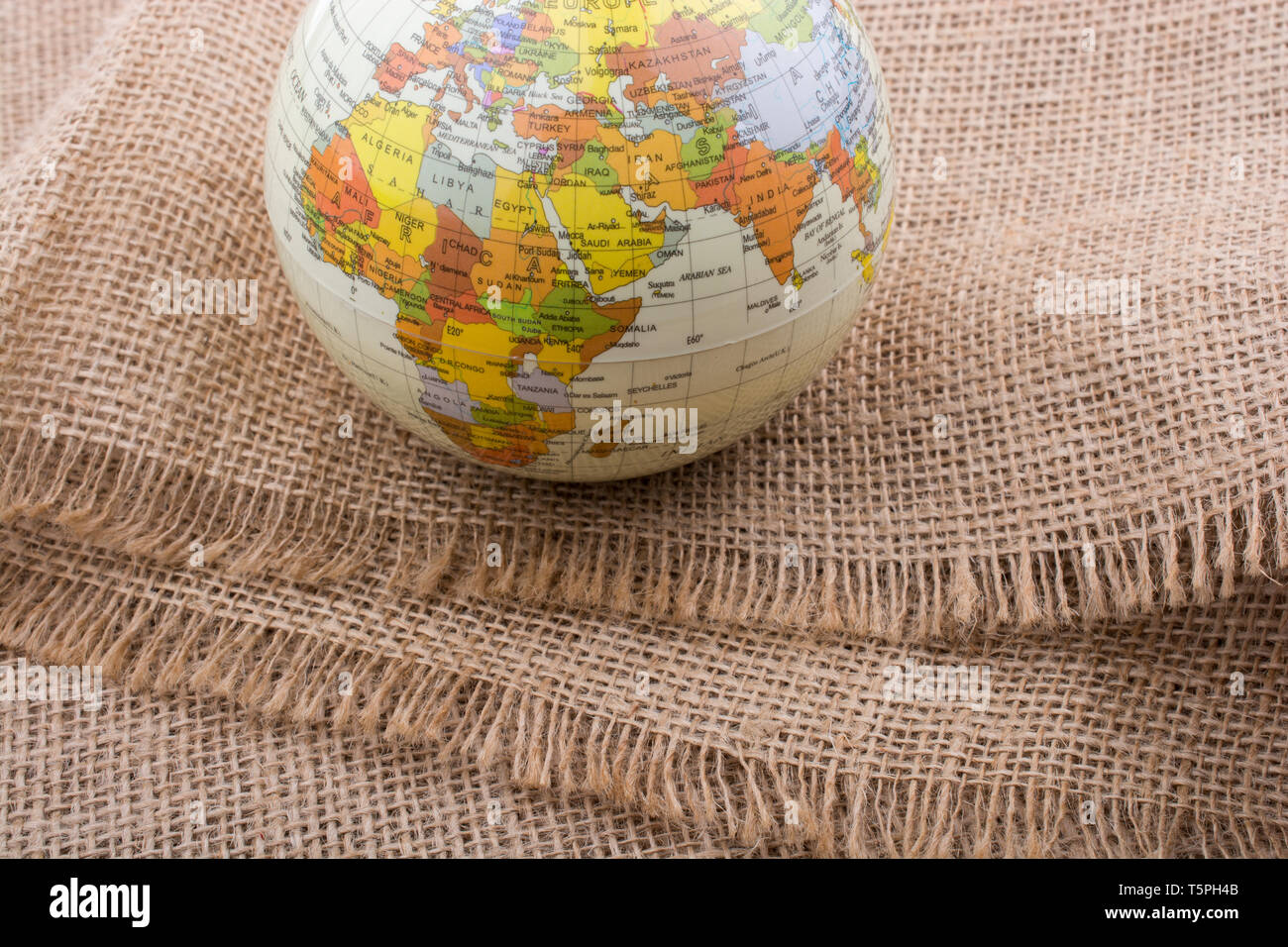 Globe is placed on canvas background Stock Photo - Alamy
