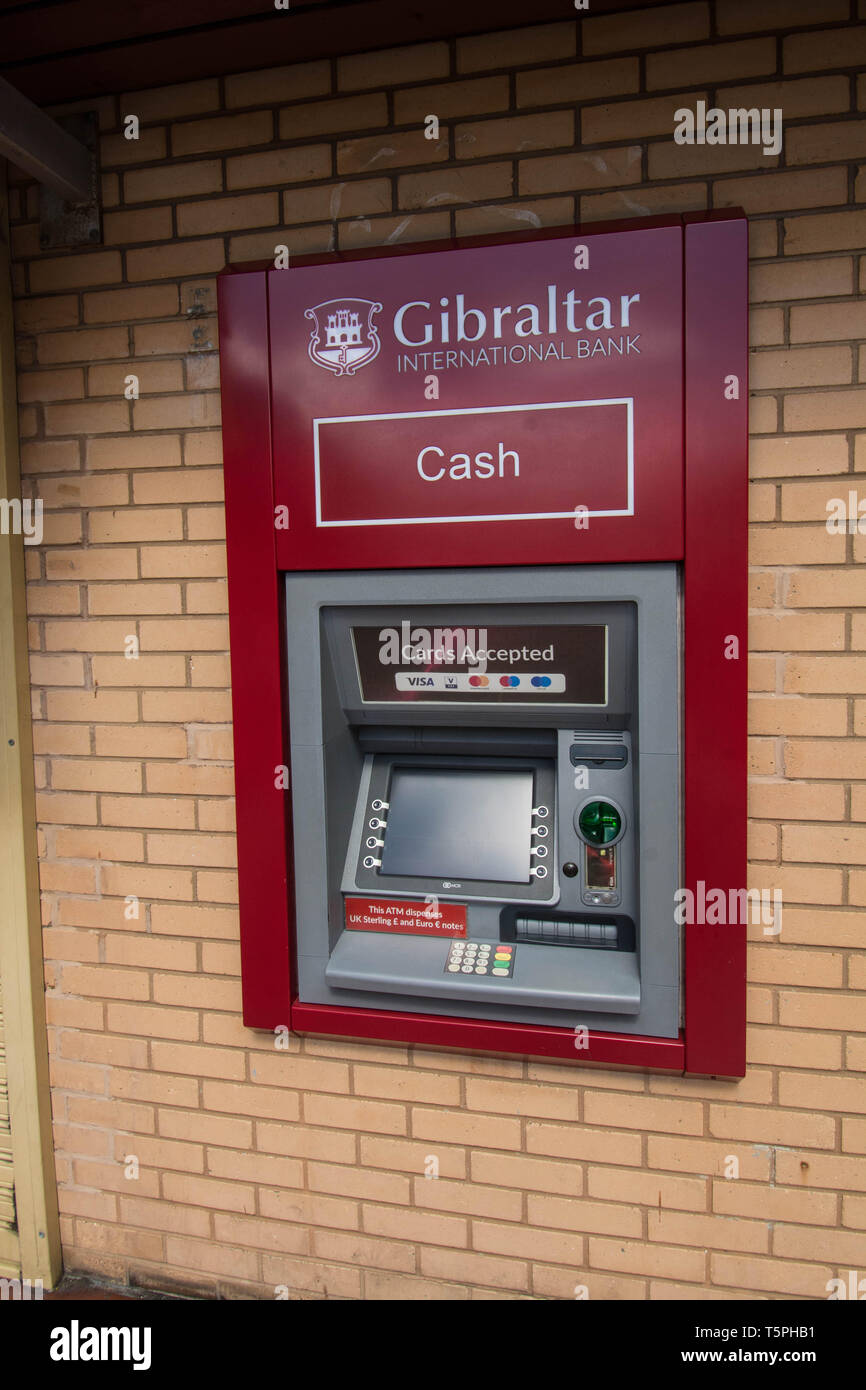 Cash machine in Gibraltar money hole in the wall bank outside new style ...