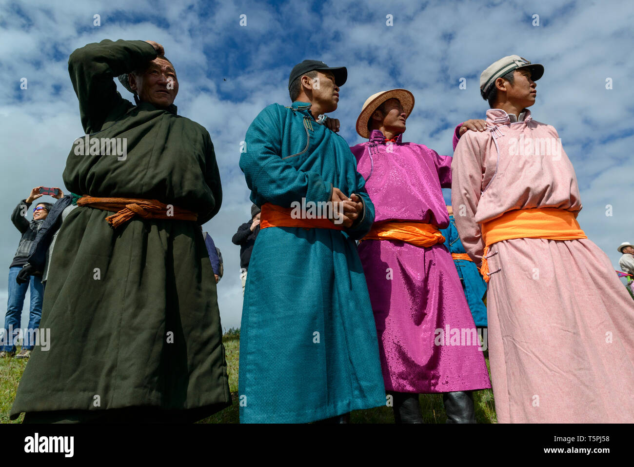 Naadam Festival in Khatgal, Mongolia. Spectators in their traditional ...