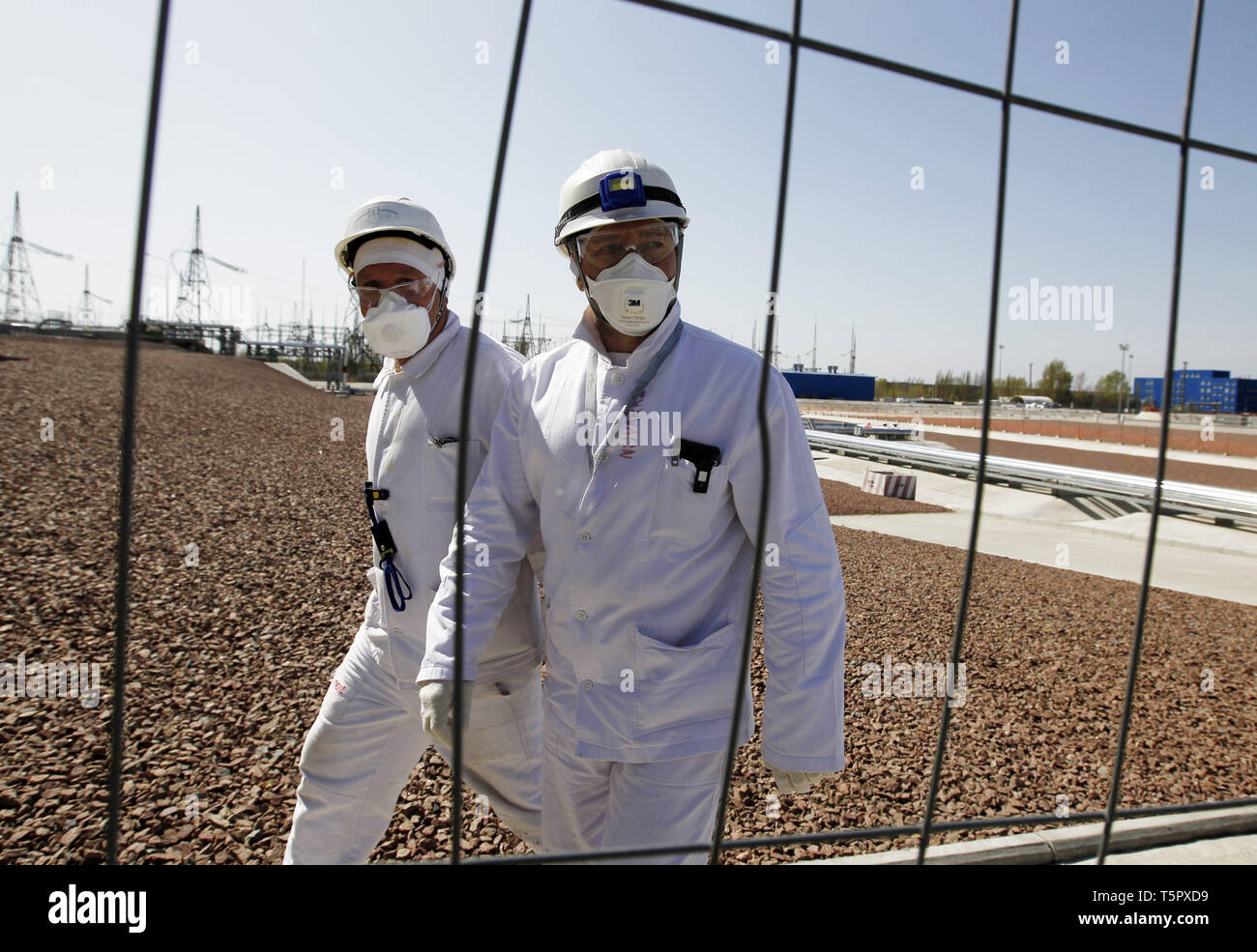 Kiev, Ukraine. 26th Apr, 2019. The workers walk at the Chernobyl ...