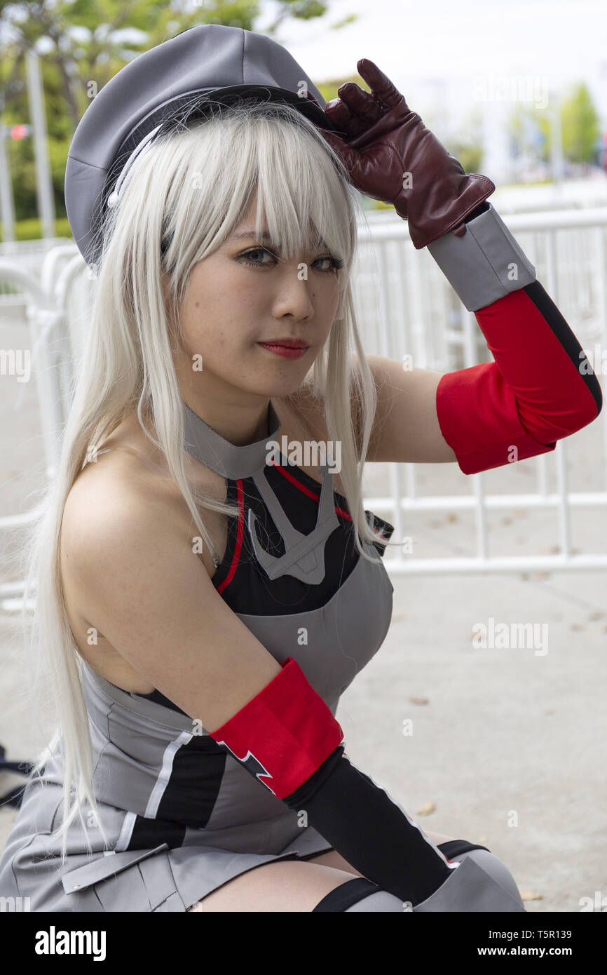 Chiba, Japan. 27th Apr, 2019. A cosplayer poses for a photograph during ...