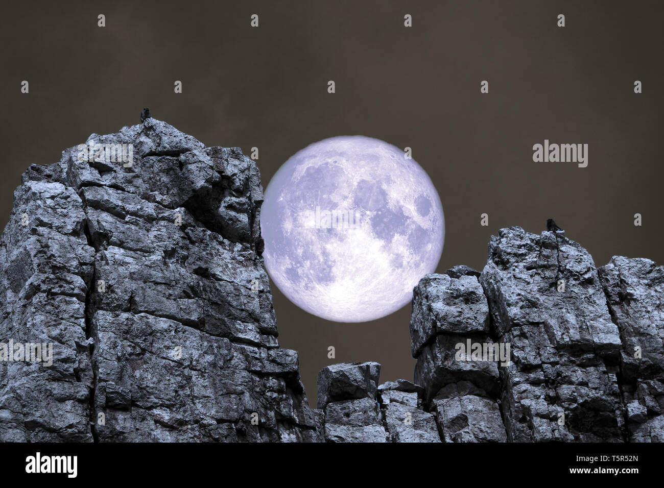 blue moon back over stone and monsters on rock between cliff, Elements ...