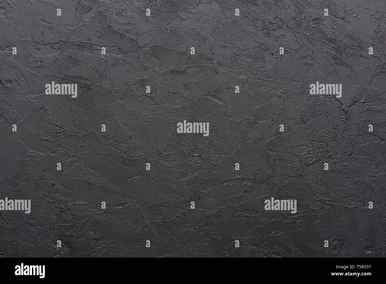 Dark black painted stucco background texture Stock Photo - Alamy