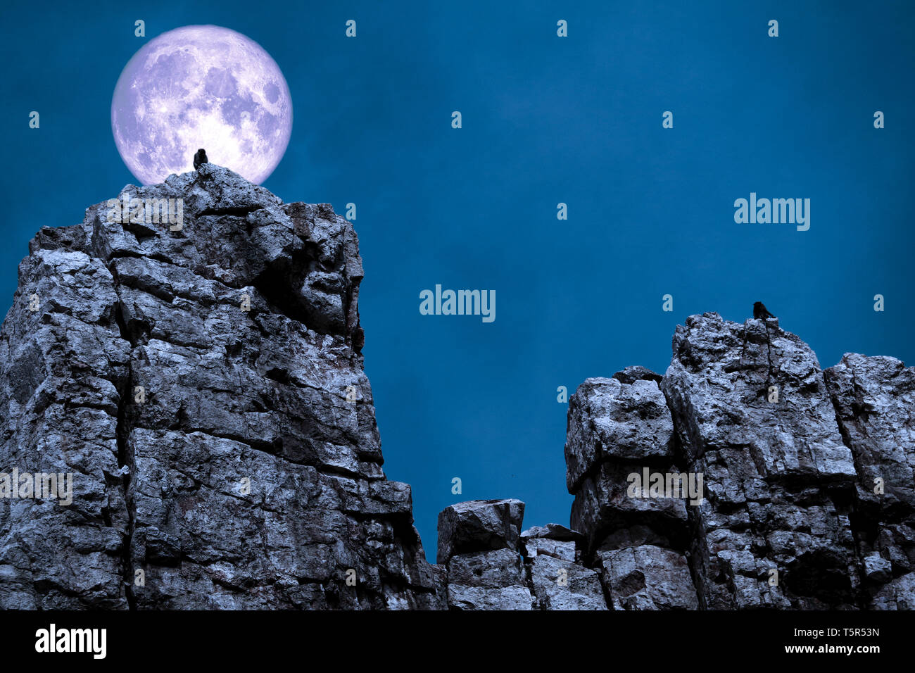 blue moon back over stone and monsters on rock of cliff, Elements of ...