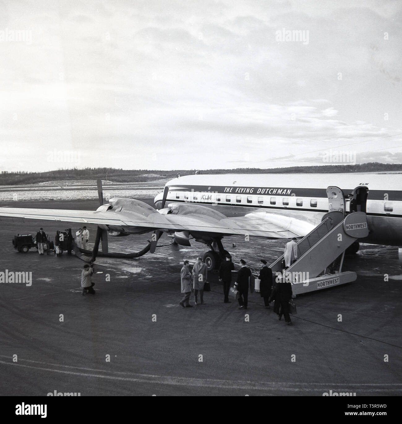 Boarding plane 1960s hi-res stock photography and images - Alamy