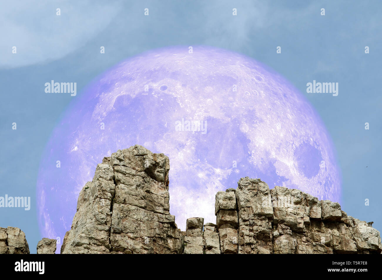 super moon back over stone on rock of cliff, Elements of this image ...