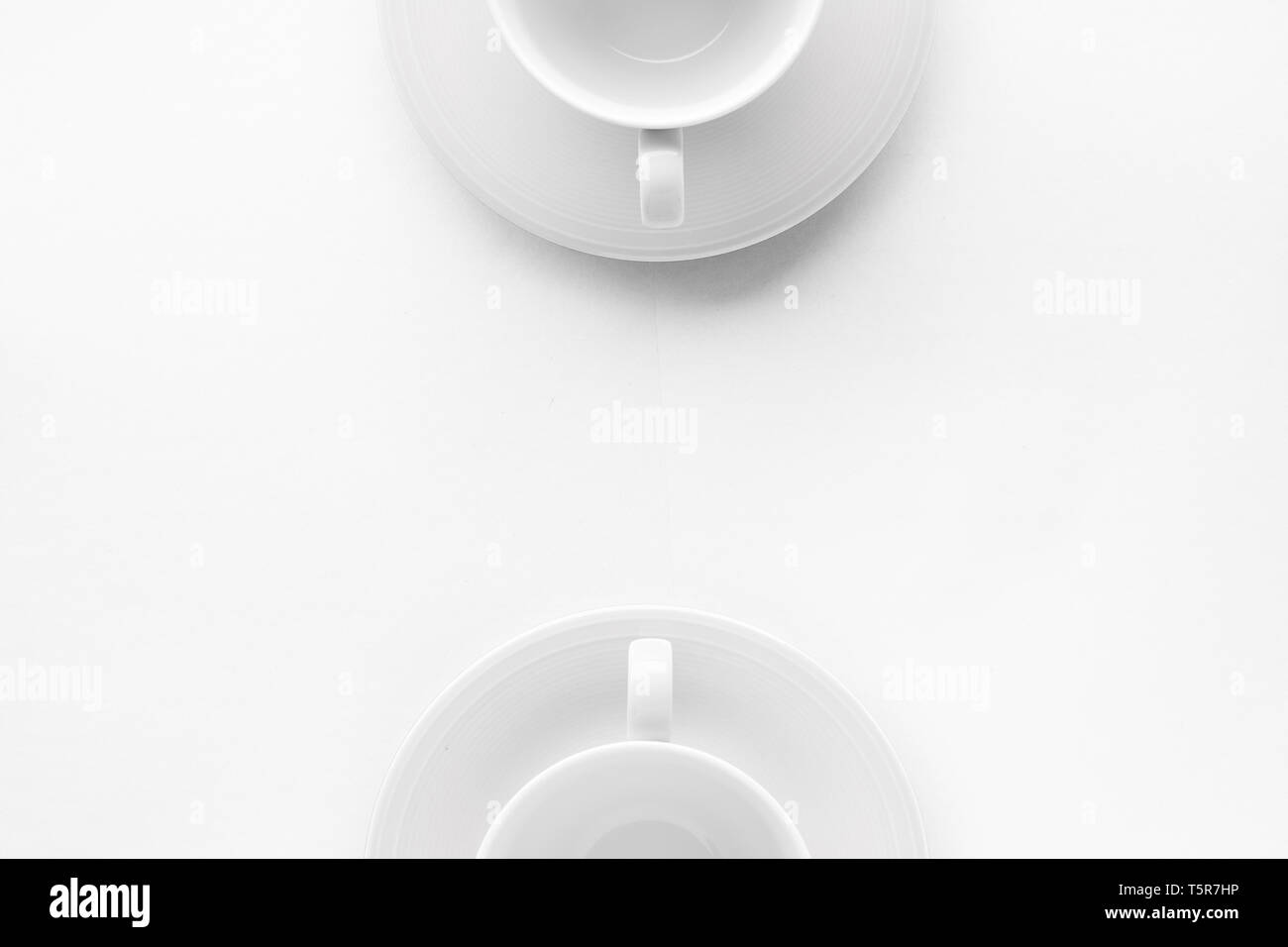 Kitchen, dishware design and drink concept - Empty cup and saucer ...