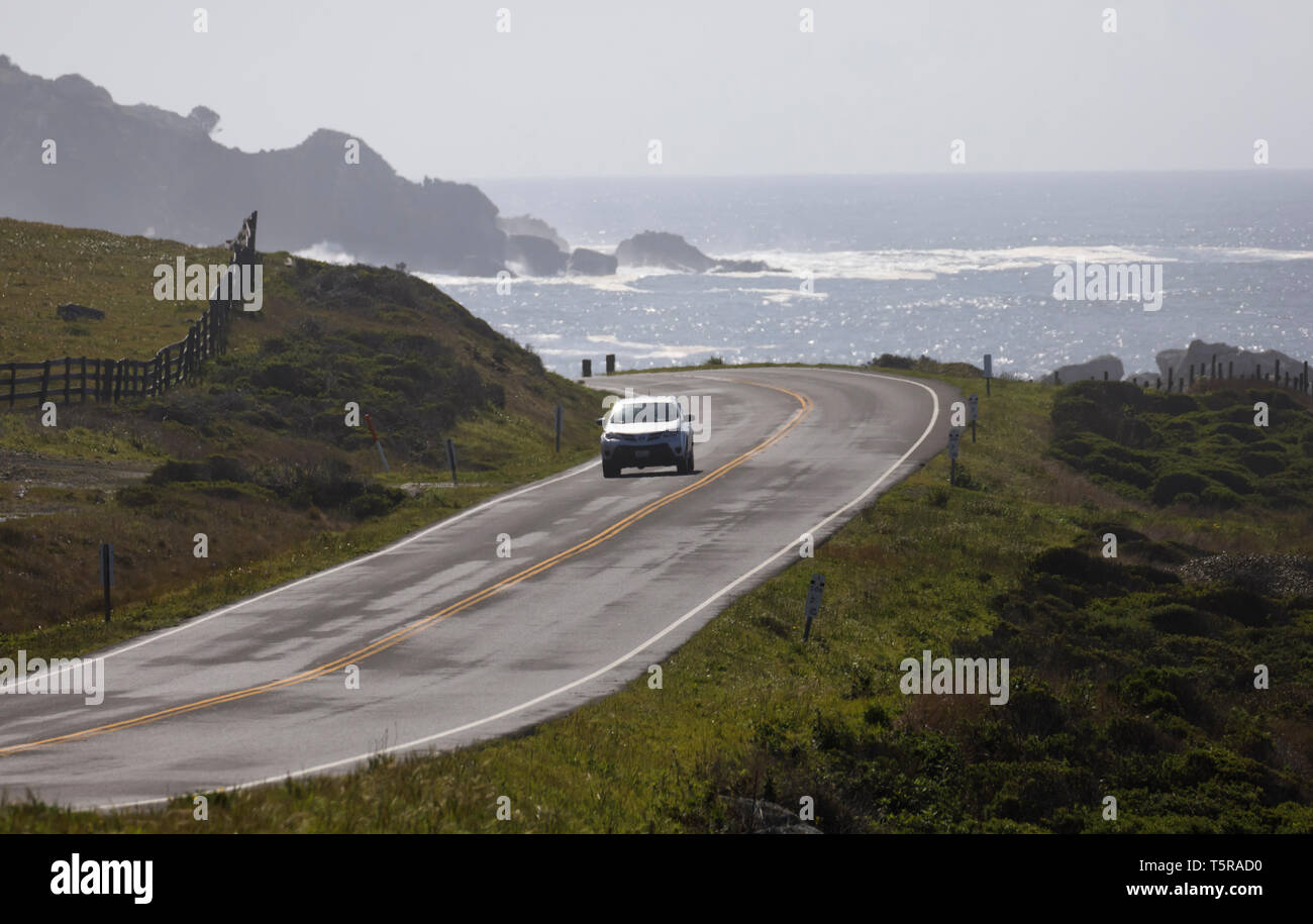 A car navigates California's State Route 1, also known as Coast Highway ...