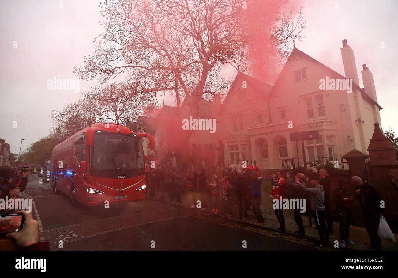 The Liverpool team bus arrives after a red flare is set off during the ...