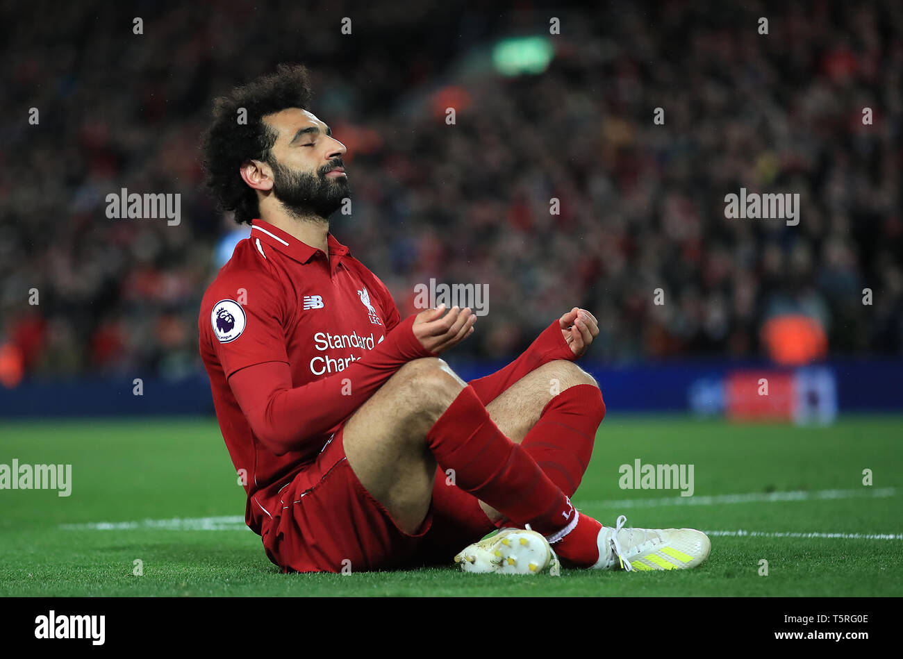Liverpool's Mohamed Salah celebrates scoring his side's fifth goal of ...