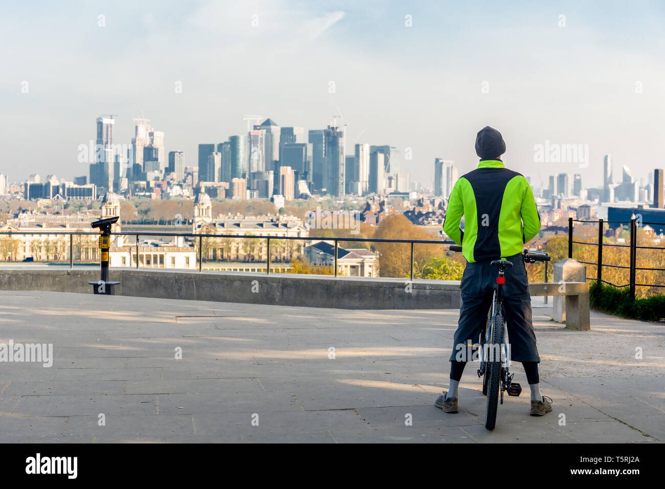 Man looking back cycling hi-res stock photography and images - Alamy