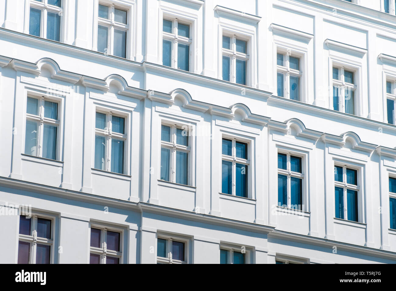renovated house facade, white building exterior - real estate concept ...