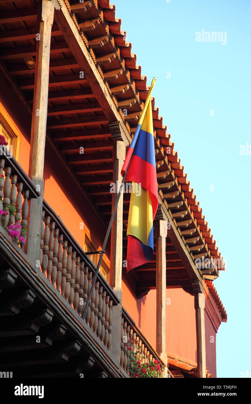 Flag of Colombia on the wooden balcony of Spanish colonial building in ...