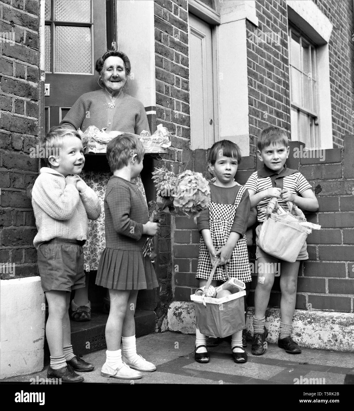 27 September 1968, South-East London. Children giving out charity food ...