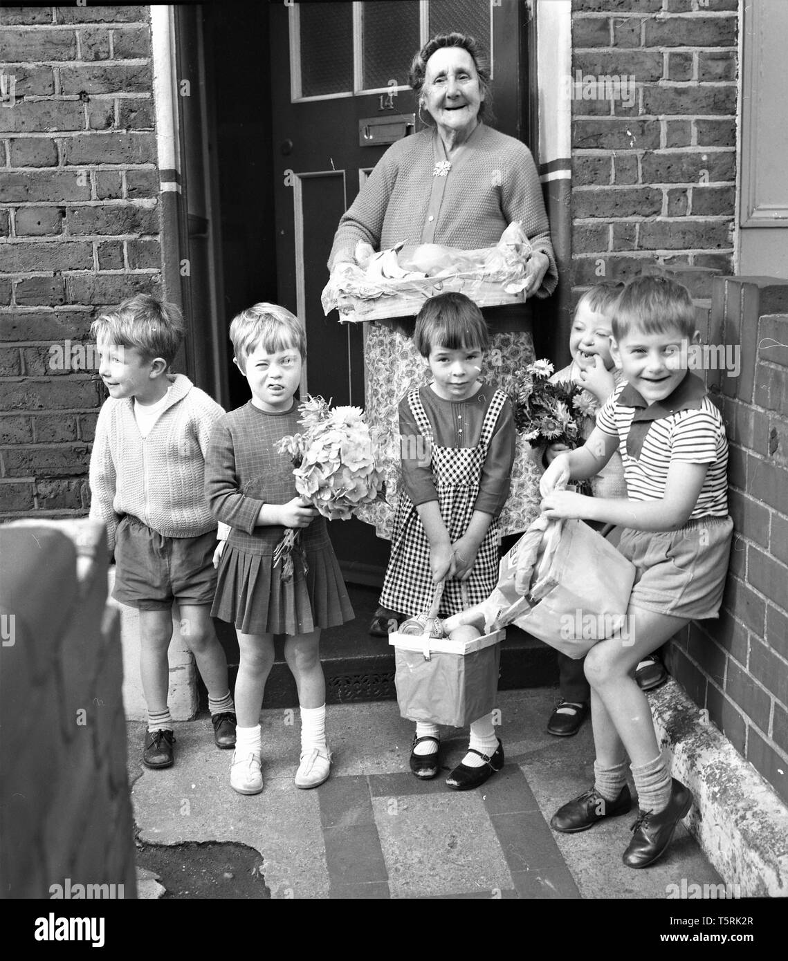 27 September 1968, South-East London. Children giving out charity food ...