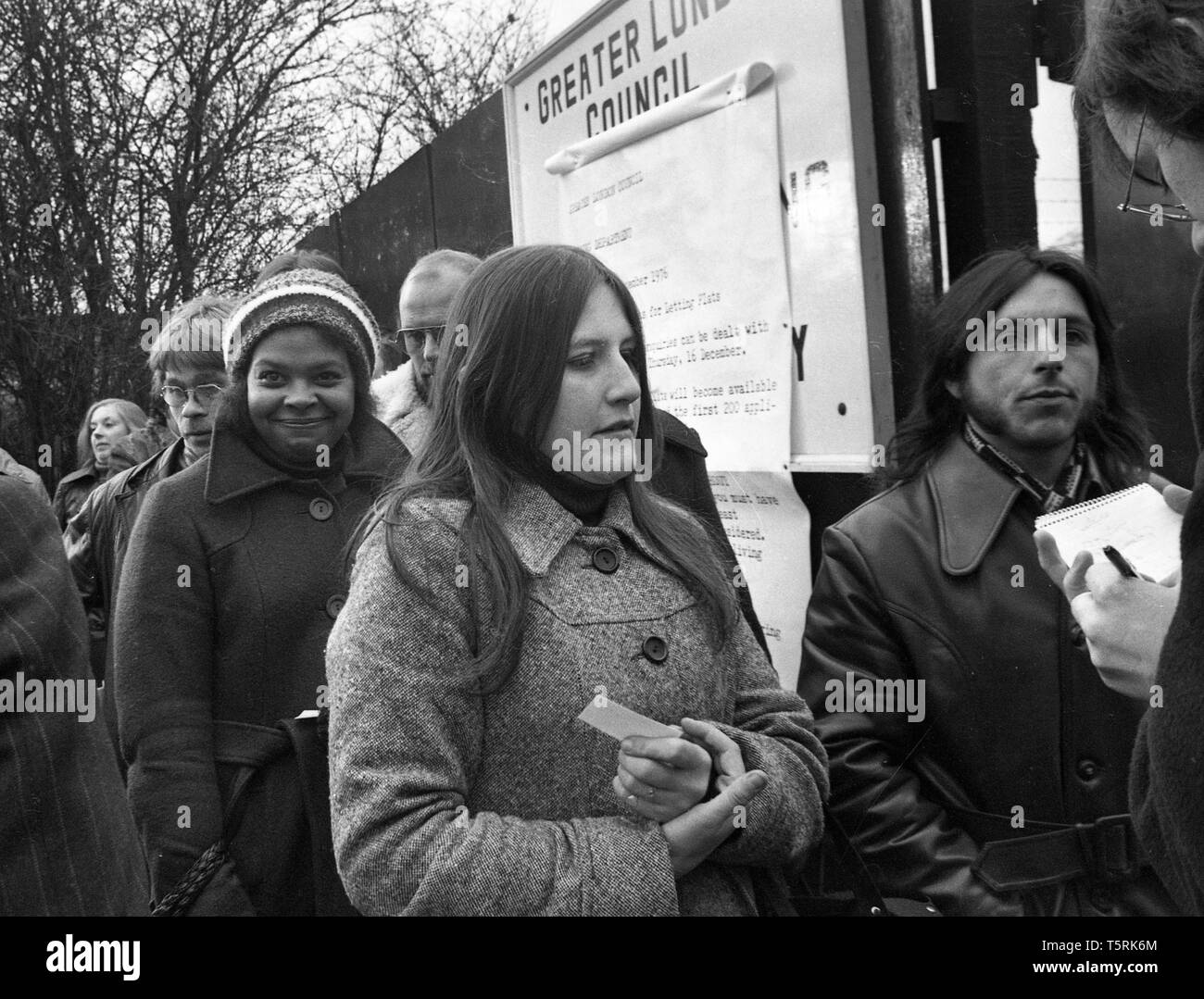 Queues of people outside the Social Housing Office in Harrow Manor Way ...